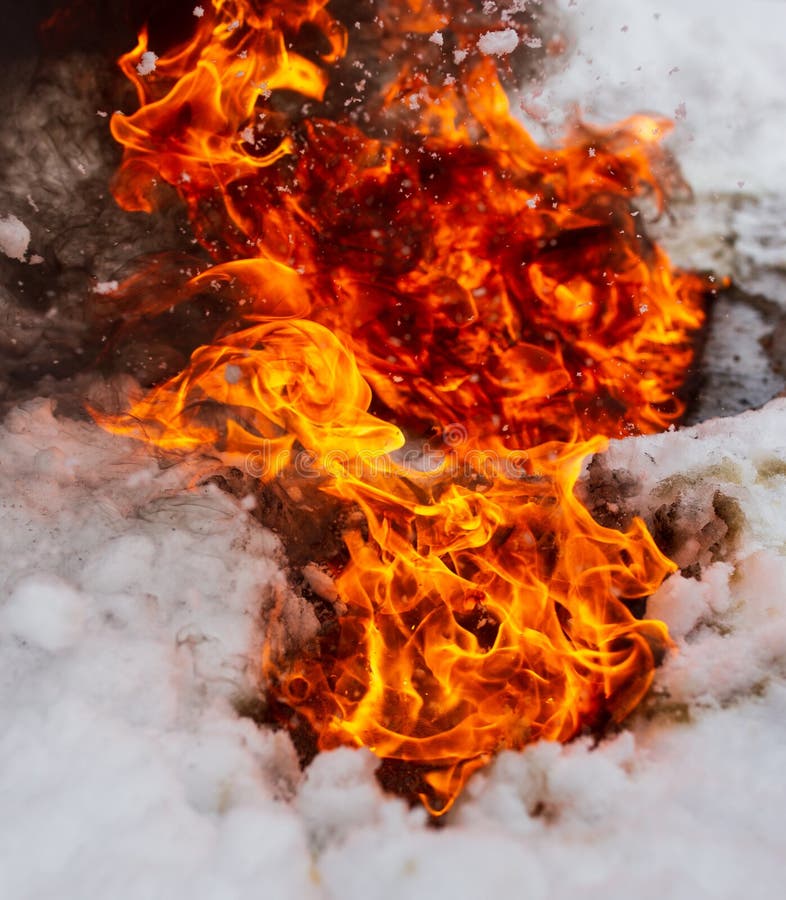 Flame of Fire on White Snow in Winter Stock Photo - Image of disaster ...