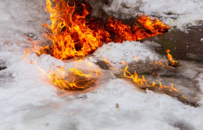 Flame of Fire on White Snow in Winter Stock Image - Image of fuel ...