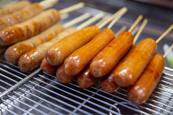Flame grilled weiners stock photo. Image of halal, snack - 394611978