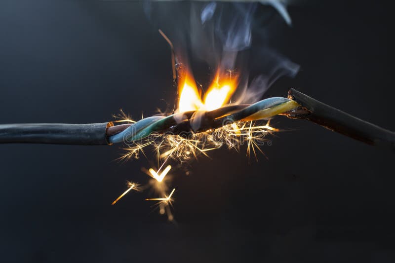 Flame Smoke and Sparks on an Electrical Cable, Fire Hazard Concept ...