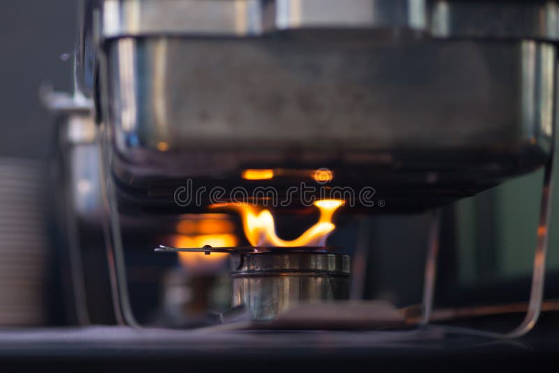 Flame under buffet warmer stock image. Image of restaurant - 45820951