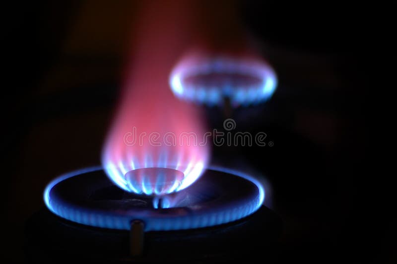 Flames from 2 Stoves stock photo. Image of burners, round - 343564