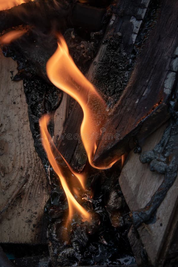 Flames in a Bonfire Burning Wood and Melted Plastic Stock Image - Image ...