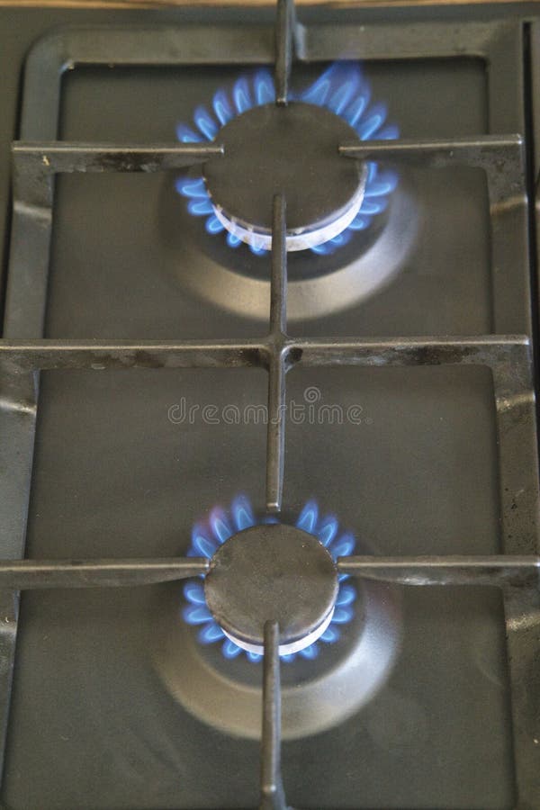 Flames Burning on a Gas Stove in a Modern Kitchen Setup Stock Image ...