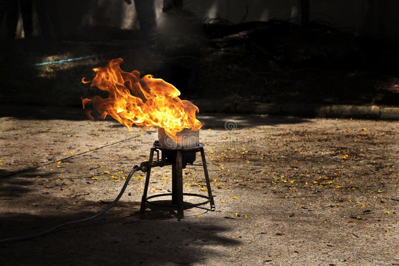 Flames Caused by the Explosion of the Oil. Demonstration of Water on ...