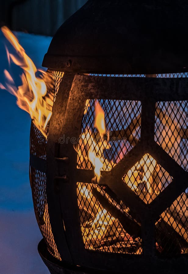 Flames Leaping from the Cage Stock Image - Image of guard, flames ...