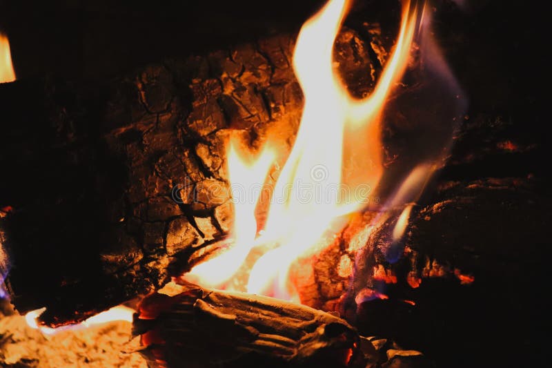 Flames Consuming a Log on a Fire Stock Photo - Image of embers ... Flames Consuming a Log on a Fire Stock Photo - Image of embers ...