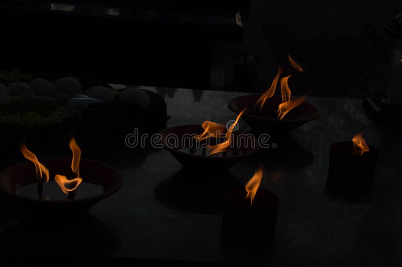 Flame in a fire bowl stock photo. Image of yellow, black - 177767358