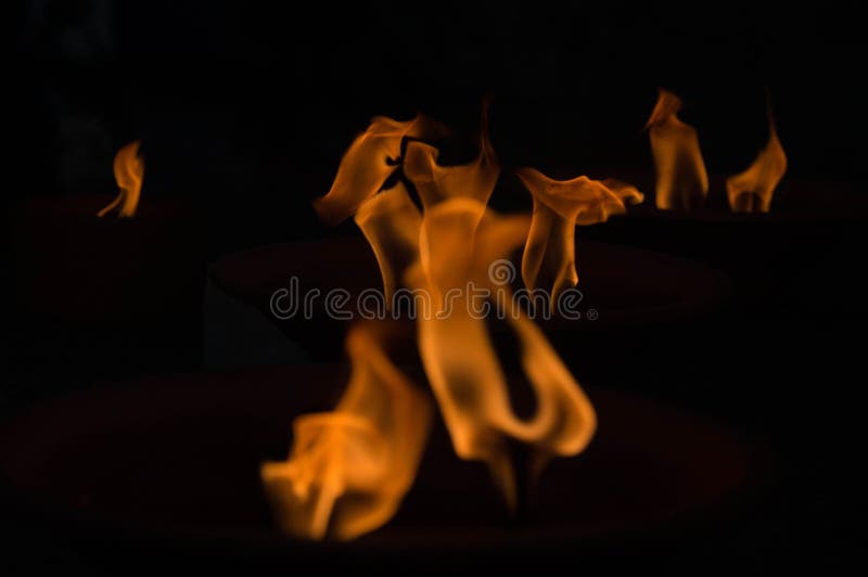 Flame in a Fire Bowl in the Dark Stock Photo - Image of yellow, flame ...
