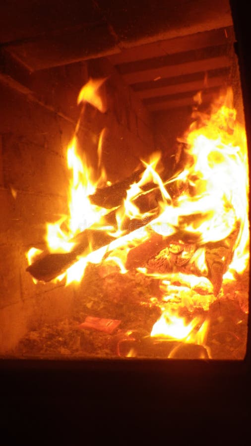 The flames of a fire stock photo. Image of forms, material - 231597802