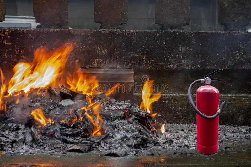 Flames and Fire Extinguishers Stock Photo - Image of outdoor, explosion ...