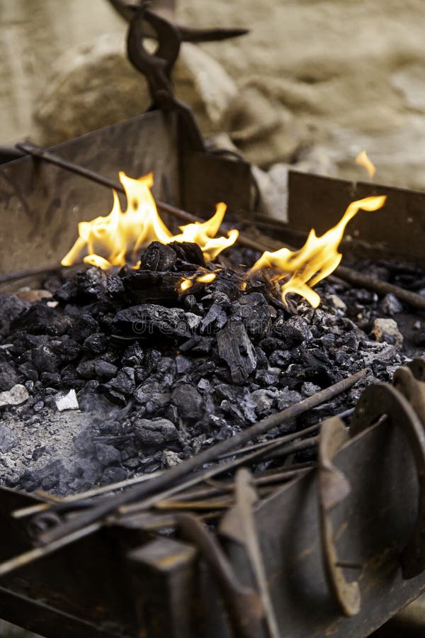 Flames in a forge stock image. Image of heat, fire, fashioned - 50601699