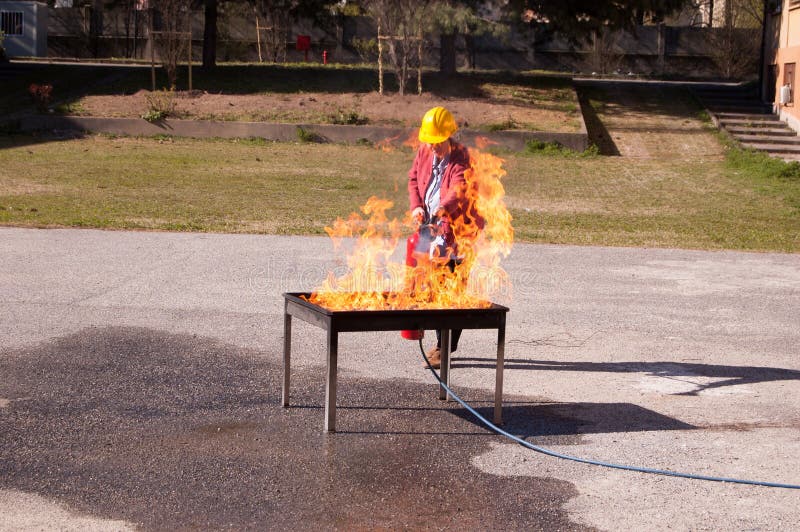 A Flames Firefighting Exercise Stock Photo - Image of smoke, drill ...
