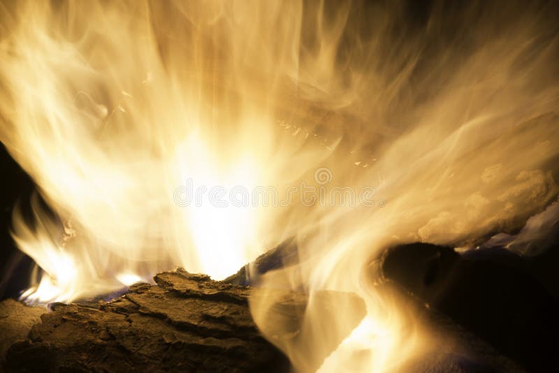 Flames and Light Bursting from Firelogs, Bright and Passionate Stock ...
