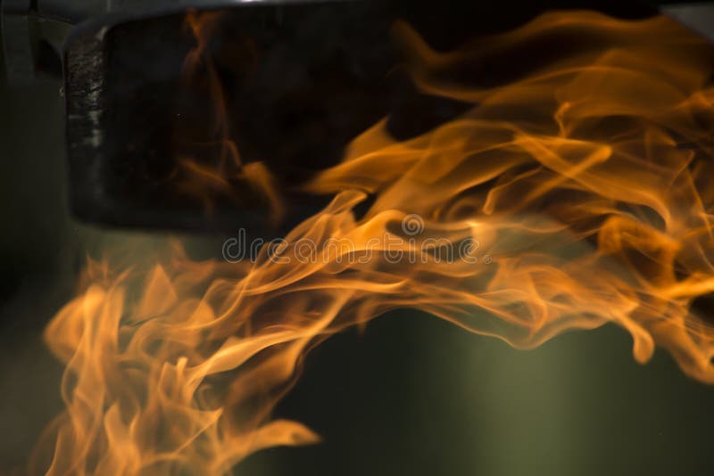 Flames Shooting from Grill stock photo. Image of cooking - 82391396