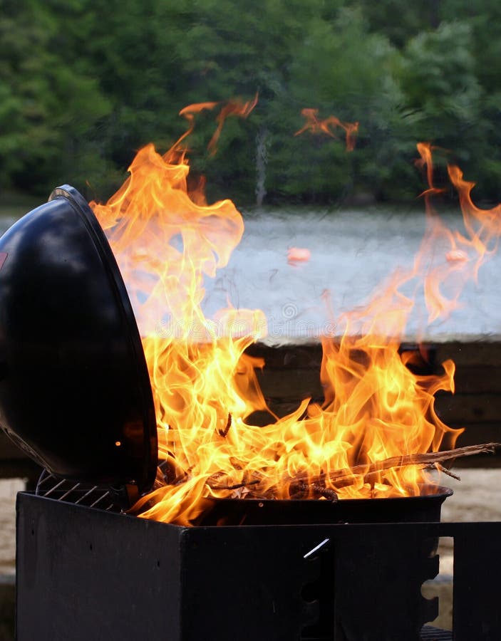 Flames Shooting from Grill stock image. Image of bonfire - 82386309