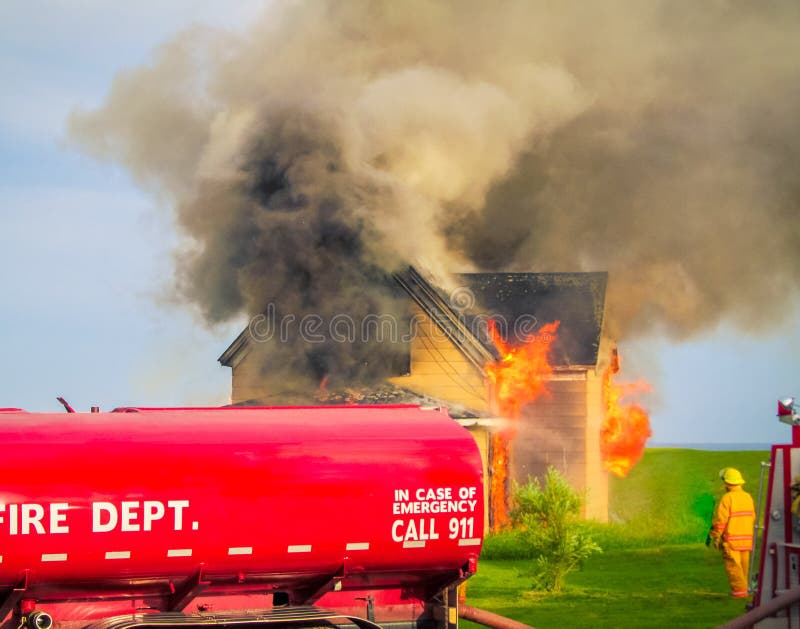 Fire Bellowing from a House Editorial Photo - Image of structure, home ...