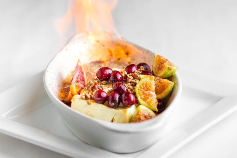 Flaming cheese stock image. Image of restaurant, food - 61152723