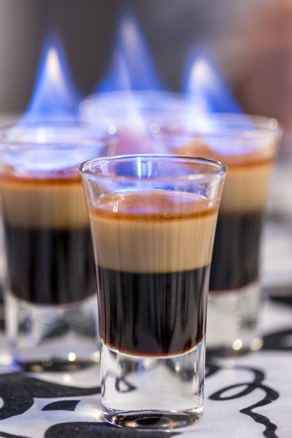 Flaming Drink. Cocktails with a Lit Fire. Close Up. Stock Photo - Image ...