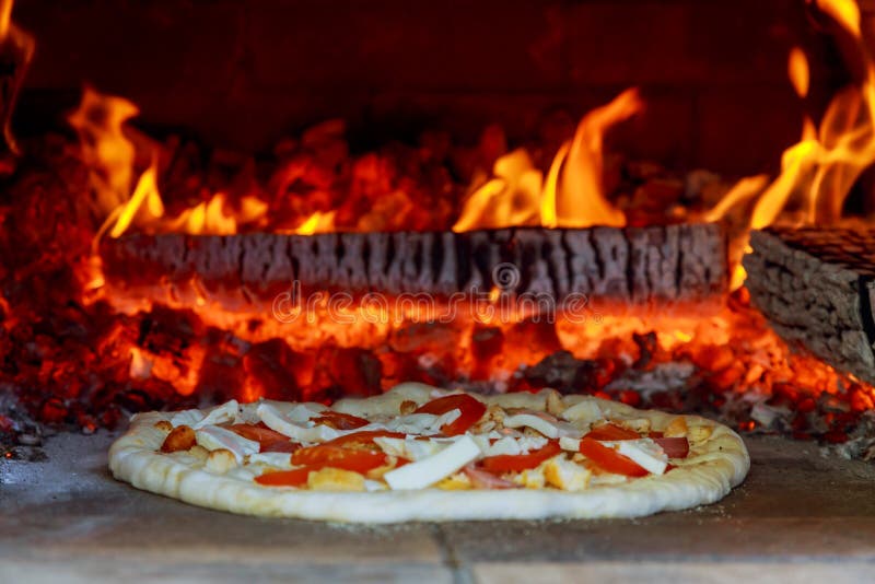 Flaming Hot Wood Fired Pizza Baking in Oven. - Stock Image - Everypixel