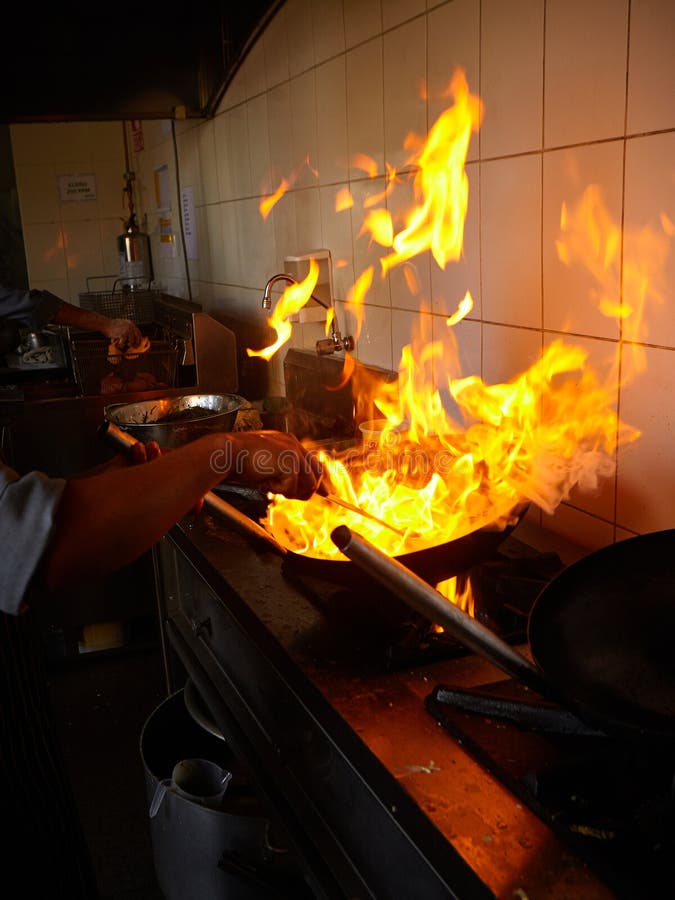 Flaming Kitchen Using a Big Wok To Prepare Peruvian Food Stock Photo ...