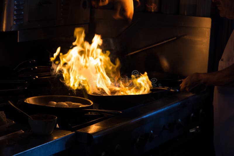 Flaming Pan stock image. Image of delicious, cooking - 68551423