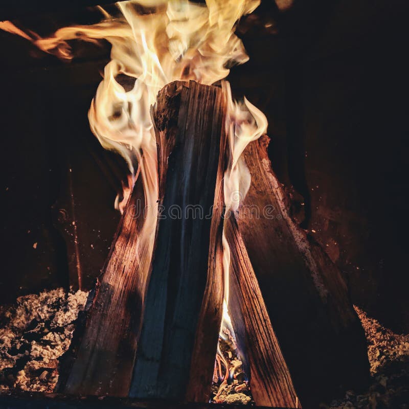Warm flames in cold days stock photo. Image of warm - 133929812