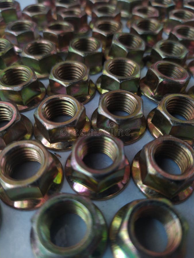 Flange Nut Color Gold for Bolt Stock Image - Image of color, flange ...