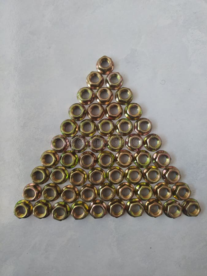 Flange nut gold triangle stock image. Image of triangle - 295591955