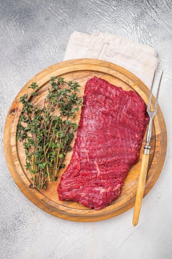Flank Steak, Raw Beef Meat with Herbs for Frying. Grey Background Stock ...