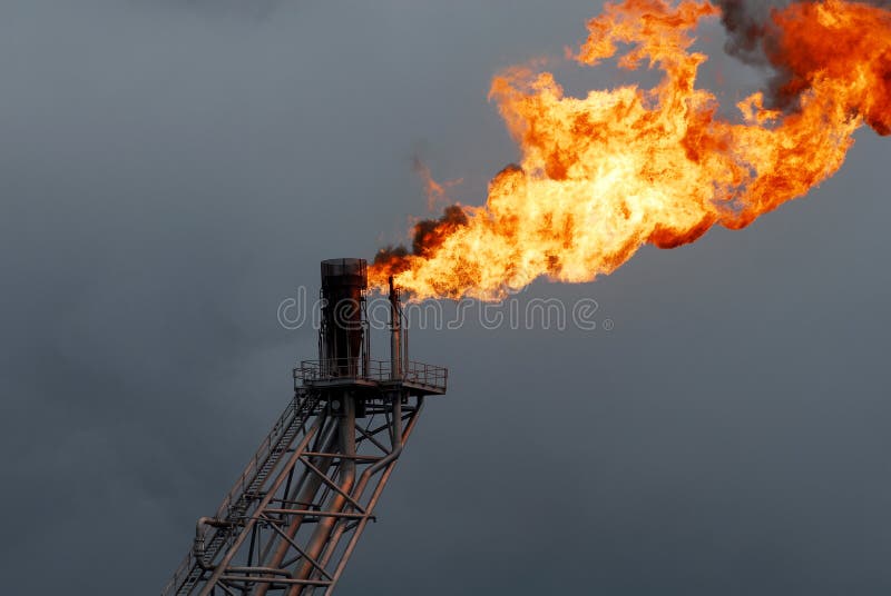 The Gas Flare is on the Offshore Oil Rig Stock Image - Image of ...