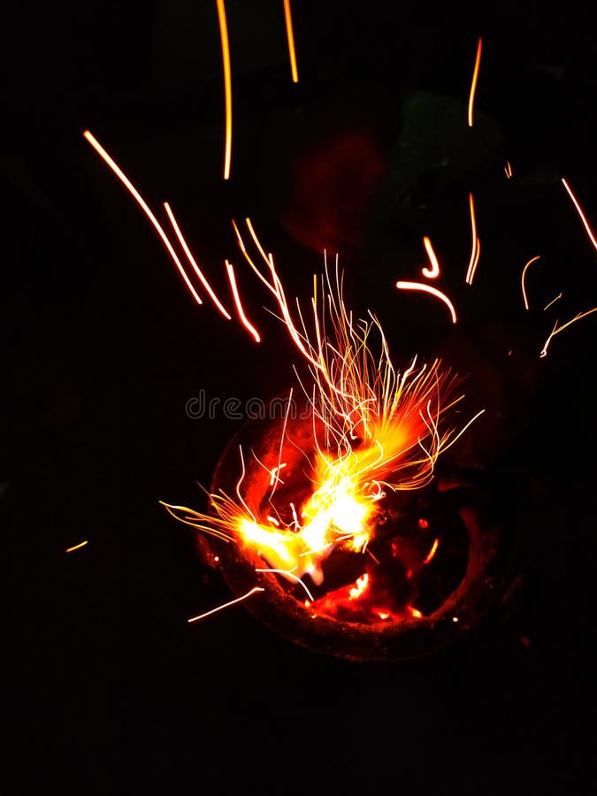 Flaring Fire Particles from Burning Firecoals Stock Image - Image of ...