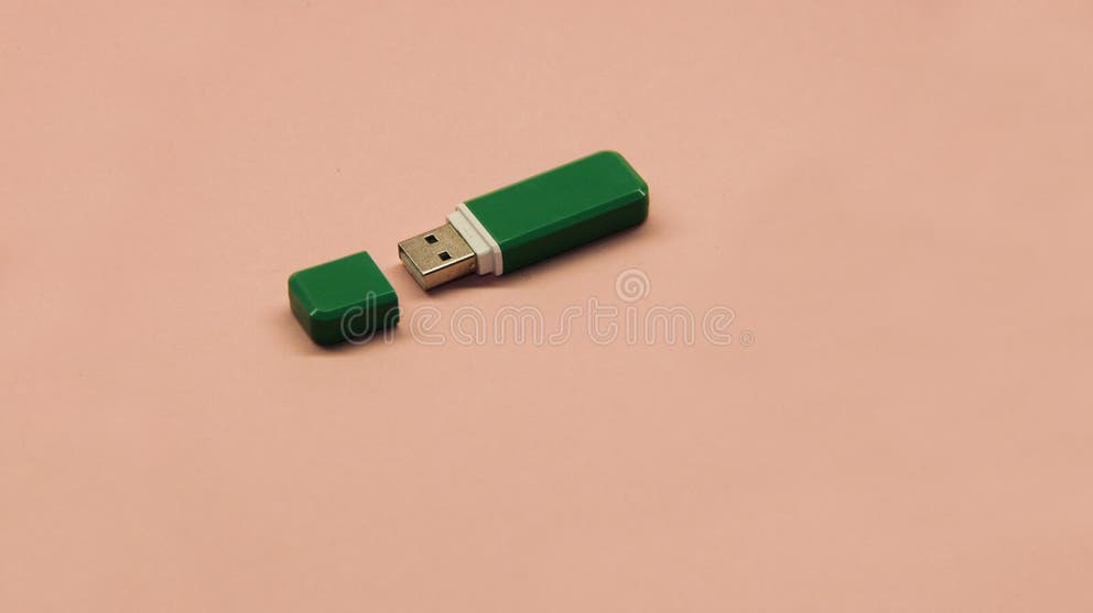 Green USB Flash Drive with Open Lid on a Light Background Stock Photo ...