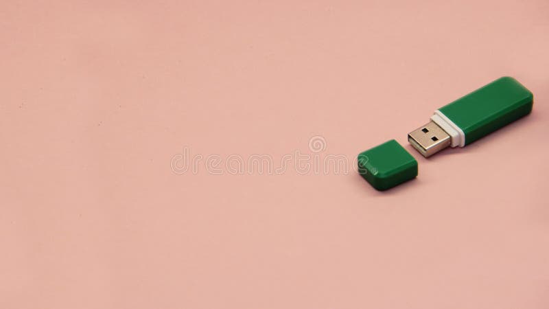 Green USB Flash Drive with Open Lid on a Light Background Stock Photo ...