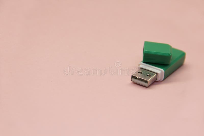 Green USB Flash Drive with Open Lid on a Light Background Stock Photo ...