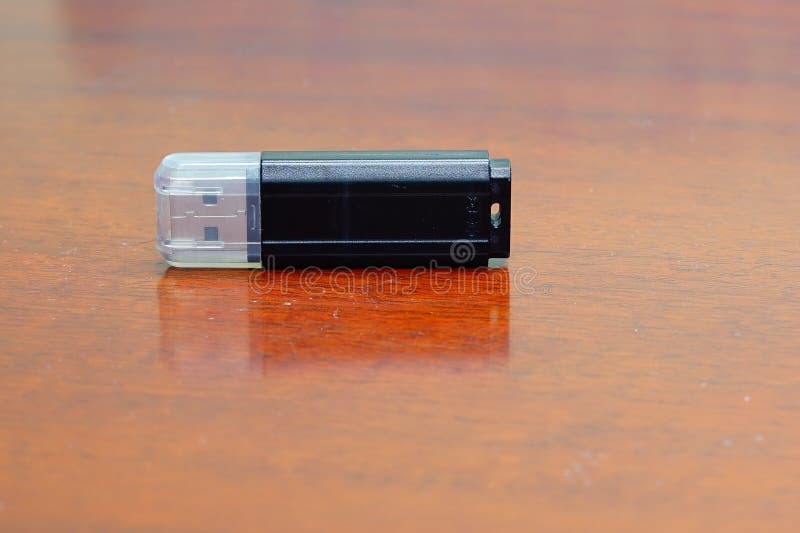 A flash drive on a table stock image. Image of pocket - 52815217