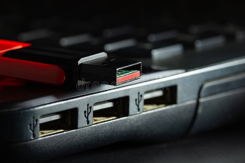 Flash Drive in USB Port of Computer Notebook in Darkness. Stock Image ...