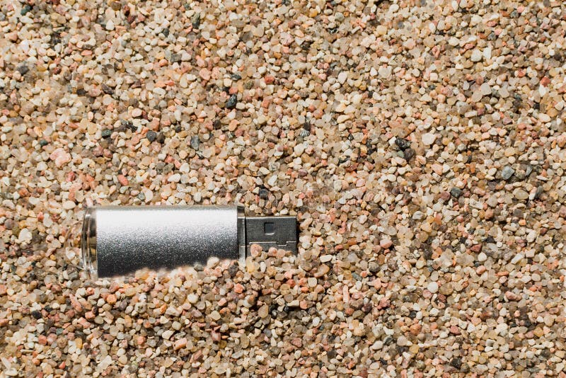 The Flash Drive Was Lost in the Sand Stock Photo - Image of memory ...