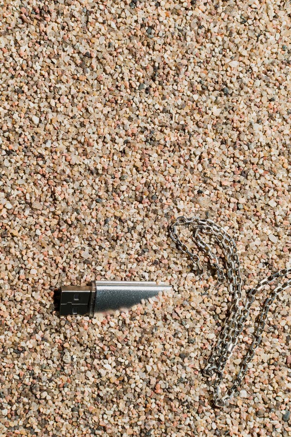 The Flash Drive Was Lost in the Sand Stock Image - Image of metal ...