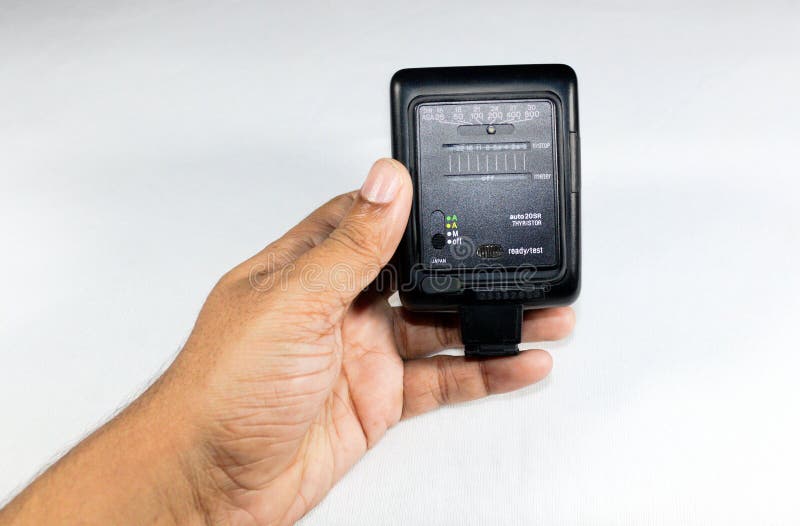 A Flash Gun Upheld in a Hand Stock Photo - Image of flashgun ...