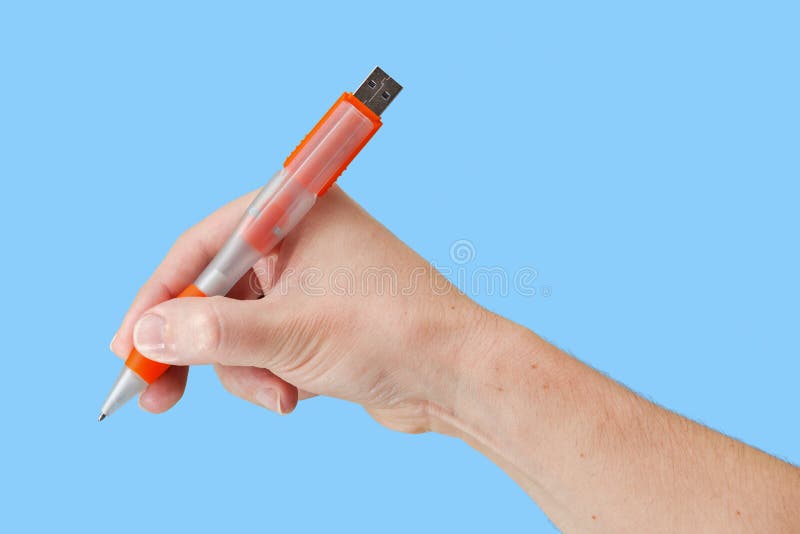Flash Memory Stick on Hand with Isolated Orange Background Stock Image ...