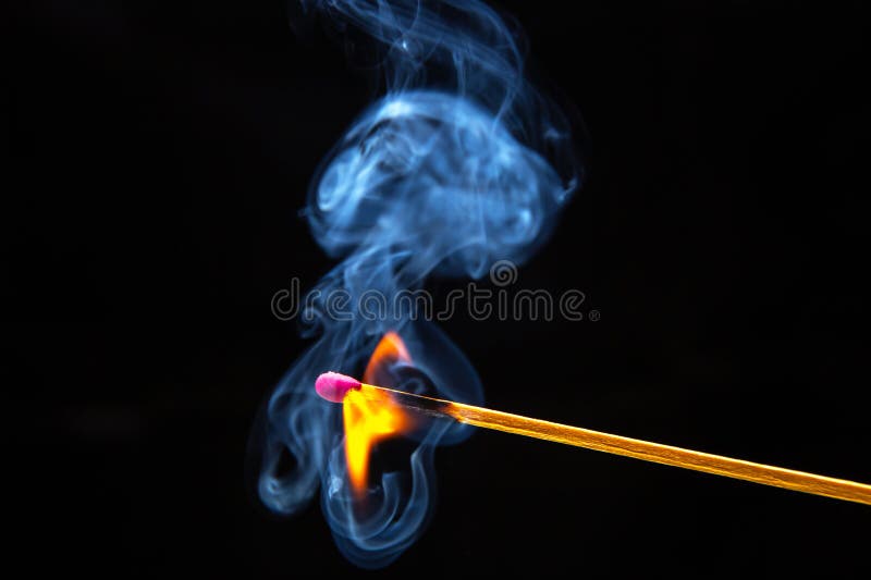 Fire and Smoke. Burning and Smoking Match on a Black Background Stock ...
