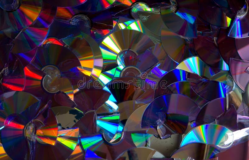 Flashed with Different Colors of Broken DVD Discs. Stock Photo - Image ...