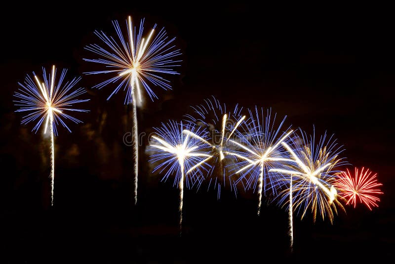 Blue, Red, White Fireworks on Dark Background Stock Image - Image of ...
