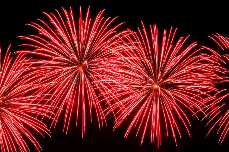 Flashes De Los Fuegos Artificiales De Colores Rojos Y Rosados Foto de ...