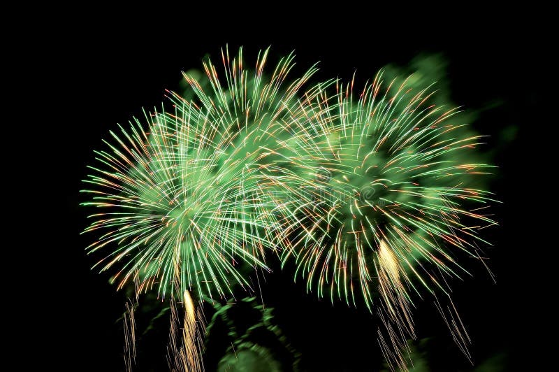 Flashes of Red, Green and White Fireworks Against Black Sky Stock Image ...