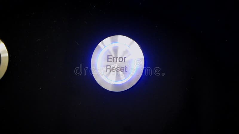 Flashing Blue Button Error Reset on Black Background Close-up. Part of ...