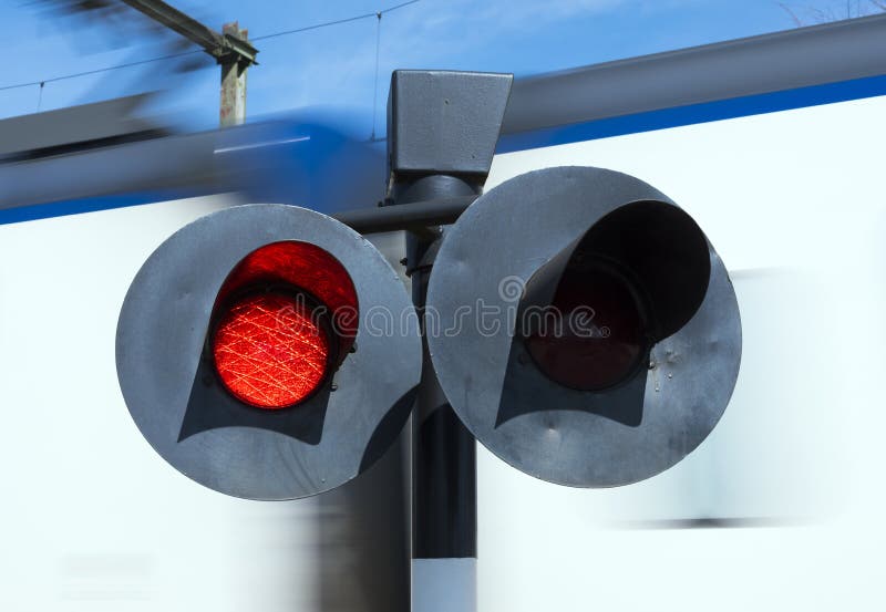 Flashing Red Lights while Train Passes Railway Crossing Stock Photo ...