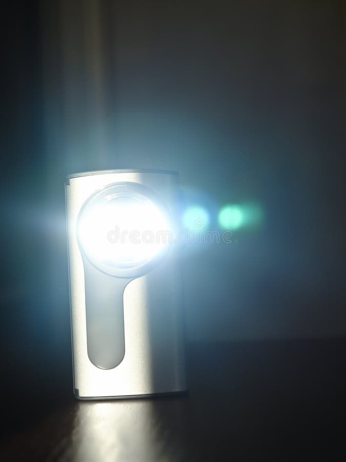 Flashlight on table stock photo. Image of bulb, bright - 883826