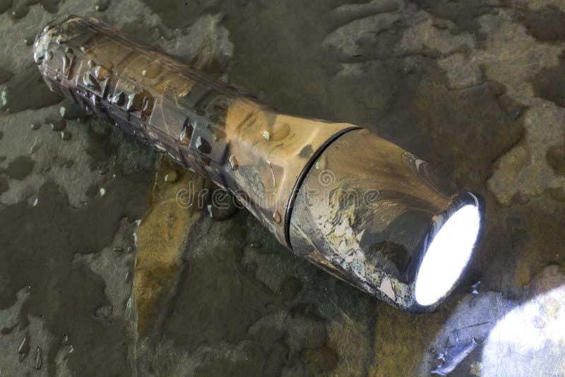 Flashlight stock image. Image of moisture, rain, bulb - 5358311